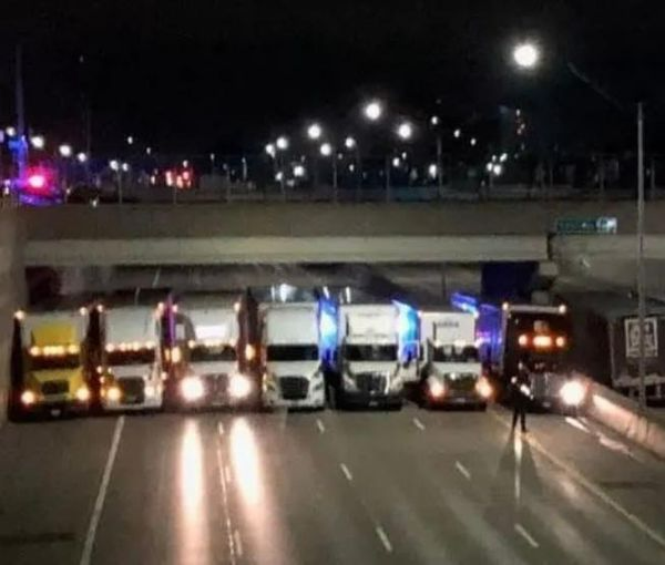 13 Truck Drivers Turn Heads After Blocking Highway To Form ‘Safety Net ...