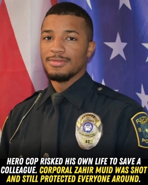 Hero cop who was shot, is honored after saving fellow officer during ...