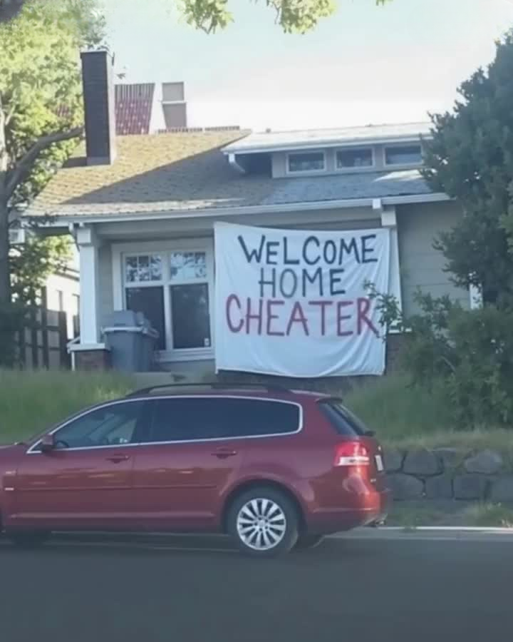 One day, a strange banner showed up outside our house—and the real ...